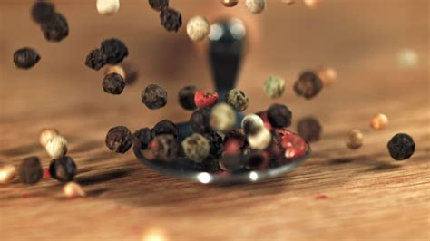 Peppecorn Falling On A Spoon Filmed On A Highspeed Camera At 1000 Fps High Quality Fullhd