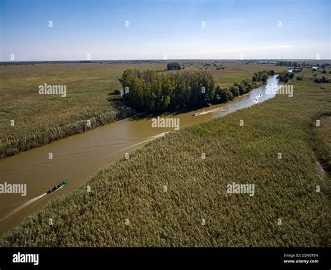 Aerial View Of Motorboat Excursion To Wetlands In The Volga Delta Near