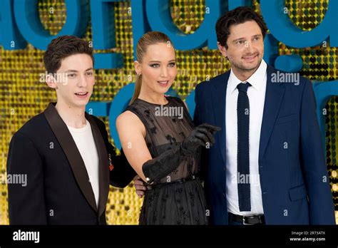 Andrew Barth Feldman From Left Jennifer Lawrence And Gene Stupnitsky Pose For Photographers