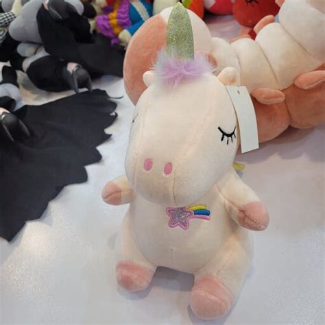 خرید و قیمت عروسک اسب تکشاخ نشسته از غرفه خرازی ضیا