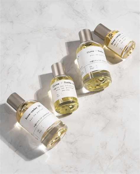 3 Clear Glass Bottles On White Textile Photo Free Ho Chi Minh City