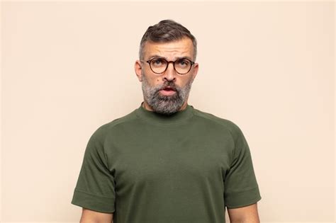 Premium Photo Adult Handsome Man Feeling Puzzled And Confused With A Dumb Stunned Expression