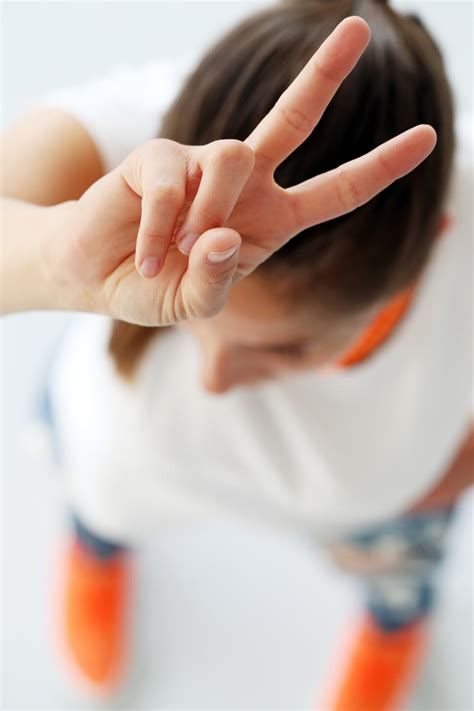 What Does It Mean When A Girl Holds Up Two Fingers At Susan Jaimes Blog