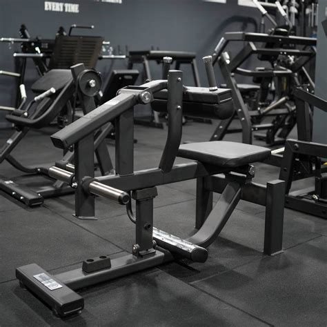 Découvrez Extension Des Mollets Assis Par Titanium Strength Dans Mundo