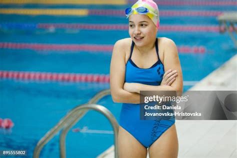 Girl Standing In Swimming Pool Photos And Premium High Res Pictures