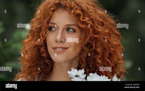 Pretty Girl With Curly Red Hair And Blue Eyes