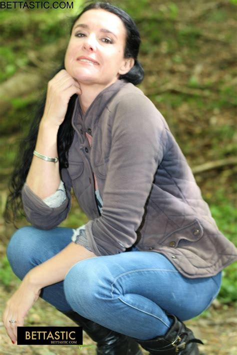 Gorgeous Brunette Babe Poses In Her Clothes Outdoors Photos