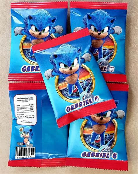 Three Packs Of Blue Candy With Sonic The Hedgehog On Them