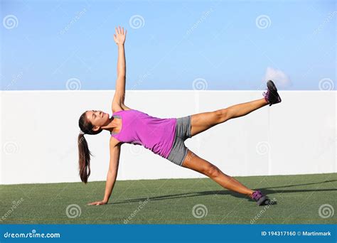 Yoga Woman Planking Doing Side Plank Leg Lift Core Exercise At Fitness