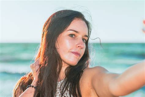 Happy Brunette Woman Making Selfie On Beach Summer Holiday Evening