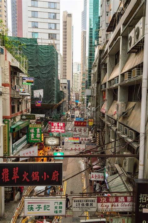 Neon Signs Advertising Stores In A Busy Street In Hong Kong Editorial