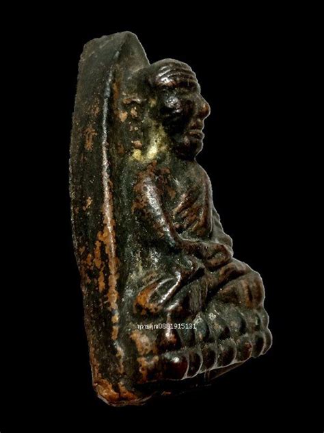 หลวงปู่ทวดหลังเตารีด รุ่นแรก วัดคอกช้าง ยะลา ปี2553 Ennxo