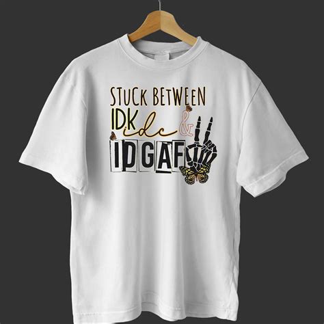 Stuck Between Idk Idc Idgaf Shirt Shibtee Clothing