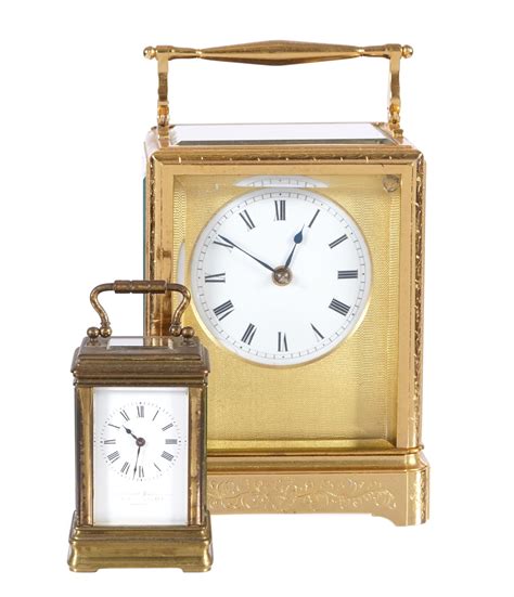At Auction Two Brass Case Carriage Clocks