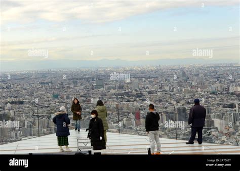 Tourist Enjoying The Views From The Shibuya Sky Rooftop Observation Deck On Top Of The Scramble