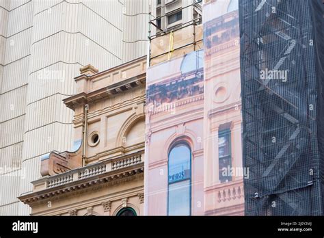 Scaffolding Mesh Screens Covering The Sydney Town Hall Are Printed With Details Of The Building