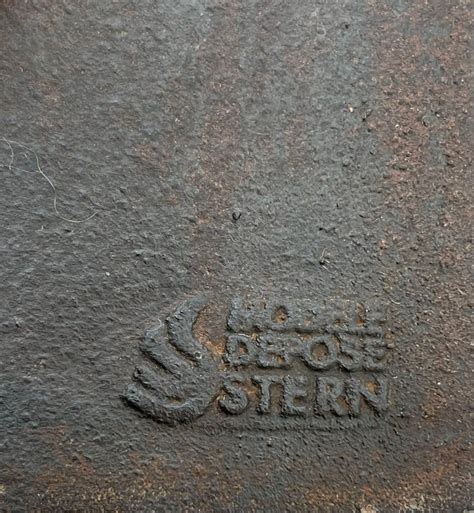Modernist Cast Iron Fireback Depicting A Nude Woman Holding A Scythe