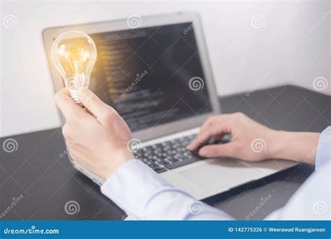 Young Woman Programmer Hand Holding Light Bulb Woman Hands Coding And