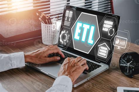 Etl Extract Transform Load Concept Person Using Laptop With Extract Transform Load Icon On