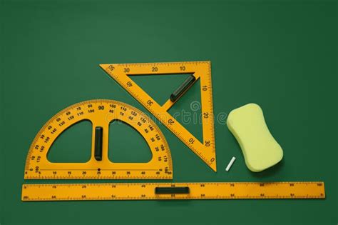 Protractor Triangle Ruler And Sponge On Green Chalkboard Flat Lay Stock Image Image Of