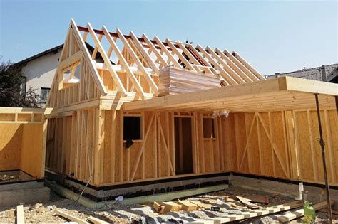 Frame Construction Timber Building With Natural Materials • Bautasi