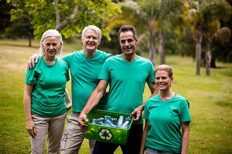 Recycling Team Members Standing In Park Photo Background And Picture