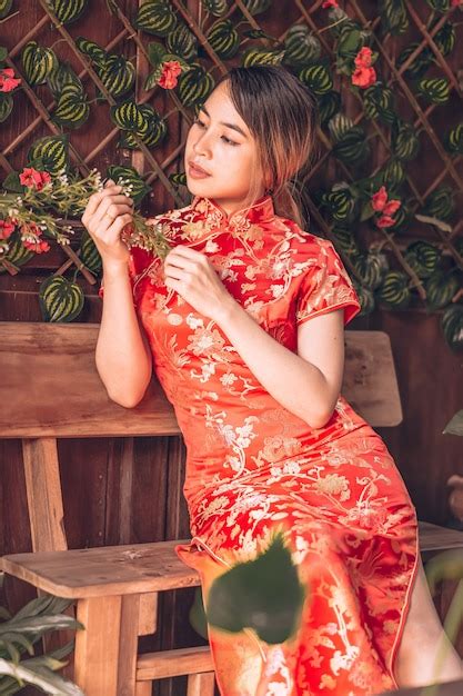 Premium Photo Woman In A Cheongsam Dress