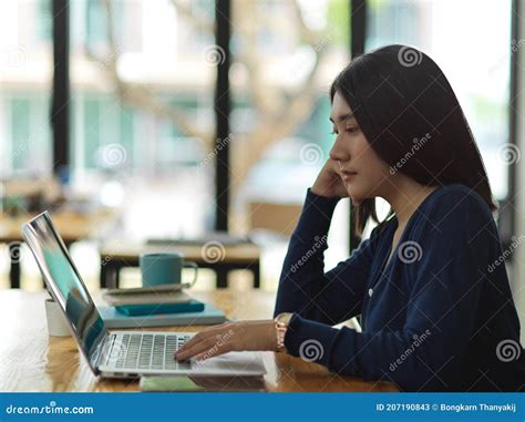 Female University Babe Doing Assignment With Laptop In Library Stock Image Image Of
