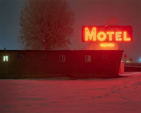 Neon Motel Sign In Snowy Night