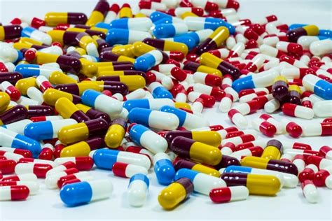 Premium Photo A Pile Of Pills On A Table With One Of Them Labeledantibacterial