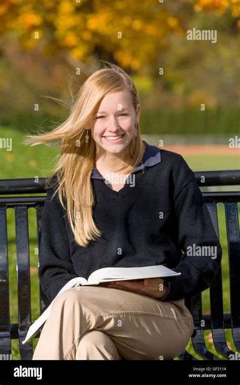 Candid Portrait Of A Teenage Girl On A Bench Private School Campus