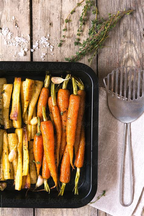 Food Roasted Carrots And Parsnip By Stocksy Contributor Pixel Stories Stocksy