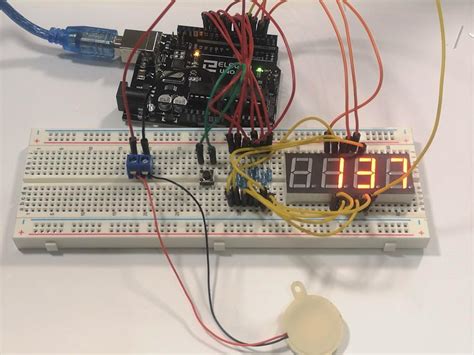 reaction timer game with 4 digit 7 segment display arduino project hub