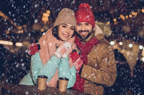 Photo Of Adorable Cute Wife Husband Walking Cuddling Enjoying Hot Beverages Mugs Smiling Outside