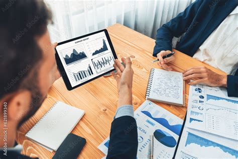 Busy Analyst Team In Office Analyzing Financial Data Analysis For Marketing Strategy In