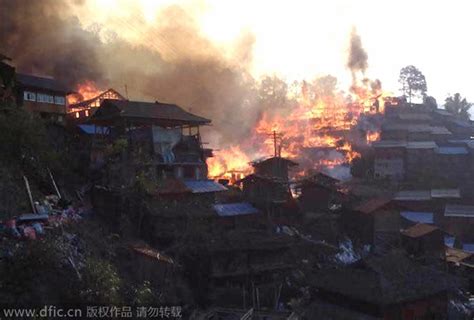 Fire Engulfs Ethnic Village In Sw China[2] Cn