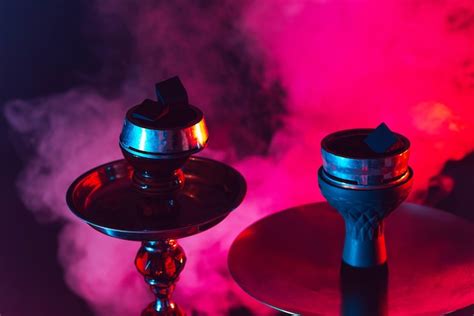 Premium Photo Modern Hookah Shisha On A Smoky Black Background With