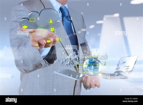 Double Exposure Of Businessman Working With A Cloud Computing Diagram On The New Computer