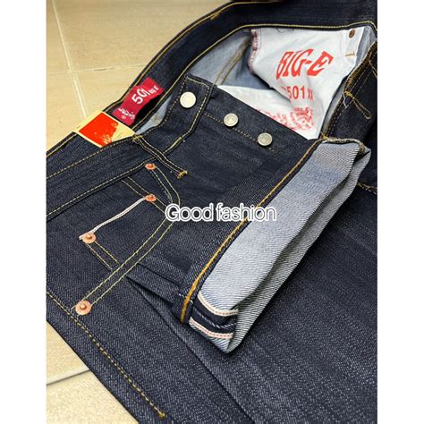 กางเกงยีนส์ลีวายขายาว ขากระบอกเป้ากระดุมริมแดงผ้าดิบผ้าแข็ง ยีนส์เข้ม Shopee Thailand