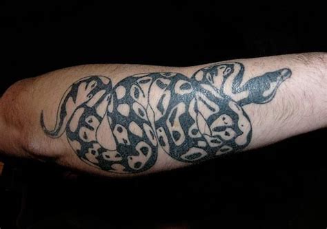 Wendy Triche And Her Ball Python Tatoo Inspired From Daves Drawing In