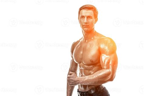 Muscular Handsome Young Man With Naked Torso Isolated On White