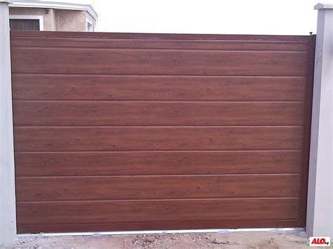 Гаражни Врати Врати дограма щори тенти Пловдив Фирма „ ЗИТА ИНЖЕНЕРИНГ ” предлага