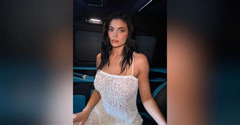 Kylie Jenner Stuns In See Through Top During Chic Paris Outing Photos