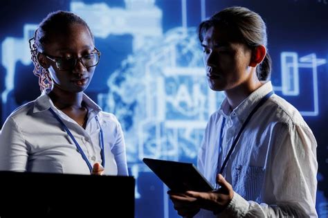 premium photo coworkers do ai systems checkup