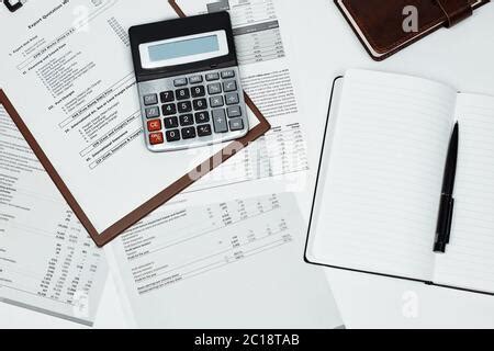 Calculating Export Import Cost Stack Of Statistic Data Calculator And Notepad Detailed