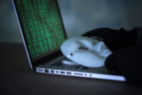 Premium Photo Hacker Wear An Anonymous Mask