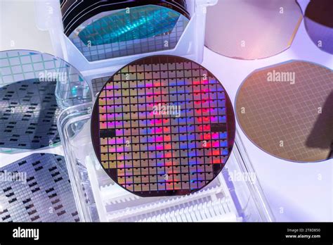 Macro Of Silicon Wafer Semiconductor With Neon Color Integrated Circuits To Manufacture Cpu And