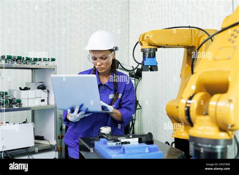 Female Automation Machine Engineer Babe Study And Inspection Control Robot Arm Machine In
