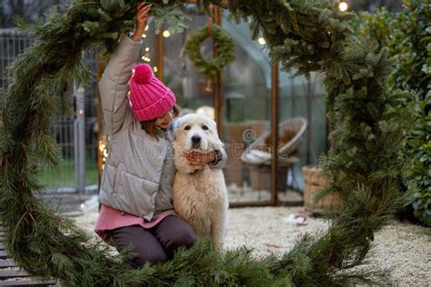 Woman with a Dog in Christmas Wreath at Backyard Stock Image - Image of ...