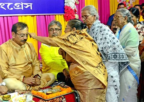 An Elderly Woman Performs Rituals To State Minister Aroop Biswas